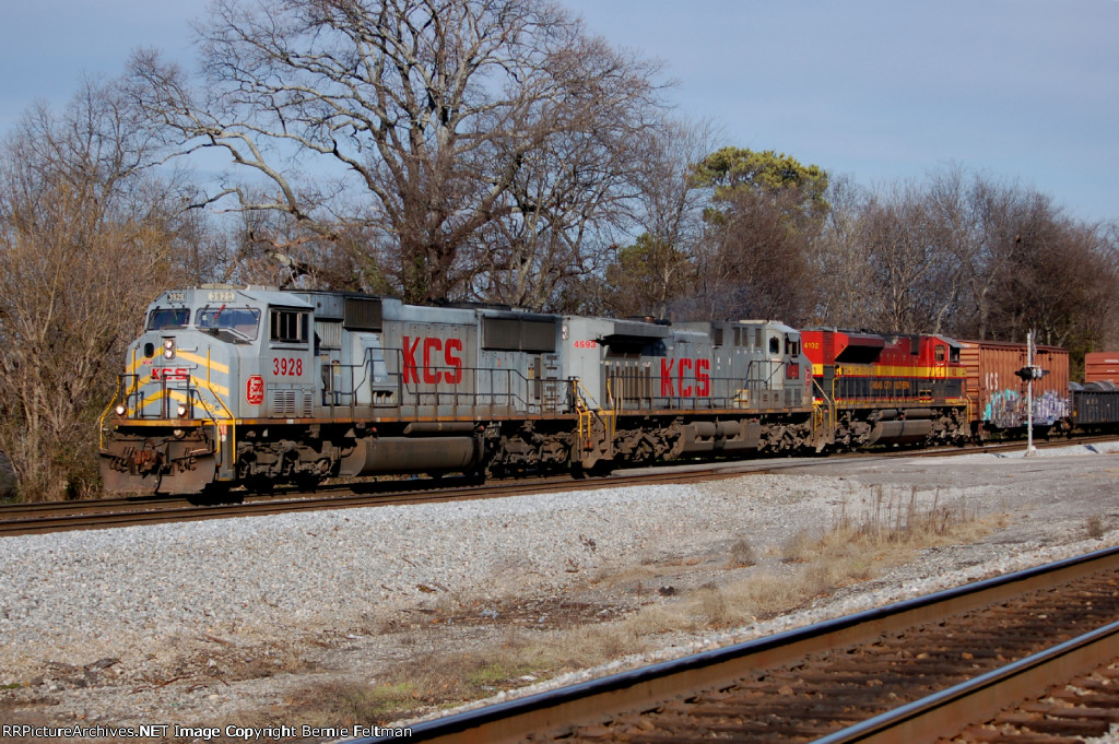 Kansas City Southern SD70MAC #3928, AC44CW #4593 & SD70ACe #4102 lead a westbound out of Norris Yard